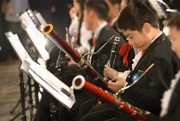 Bassoon boy in concert stock photo. Image of costume - 17570800
