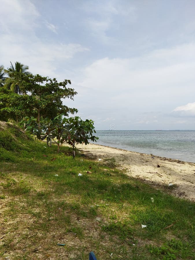 Batam beach happy stock photo. Image of coast, water - 236515994