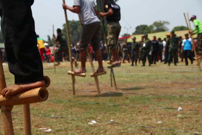 Play Egrang, a Traditional Game from Indonesia. Editorial Photo - Image ...