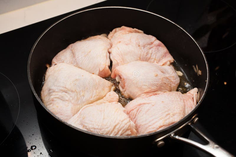 Batch Cooking Chicken Thighs in a Pan Stock Image - Image of cooking ...