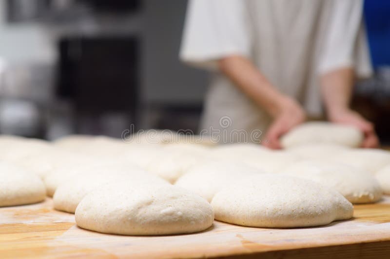 A Batch of Formed Dough Pieces on a Table in the Kitchen of a Local ...