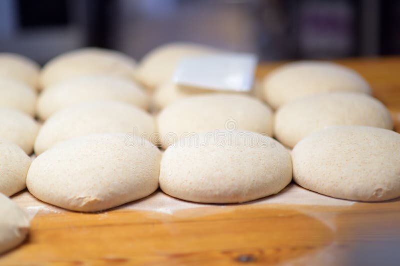 A Batch of Formed Dough Pieces on a Table in the Kitchen of a Local ...