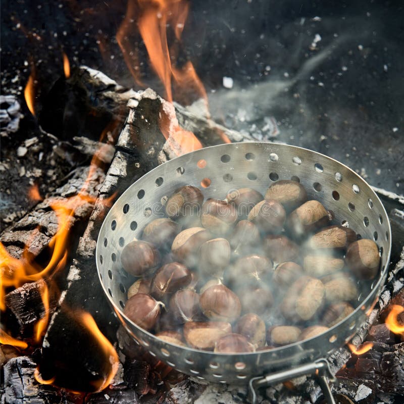 Batch of Fresh Chestnuts Sizzling Over a Hot Fire Stock Image - Image ...
