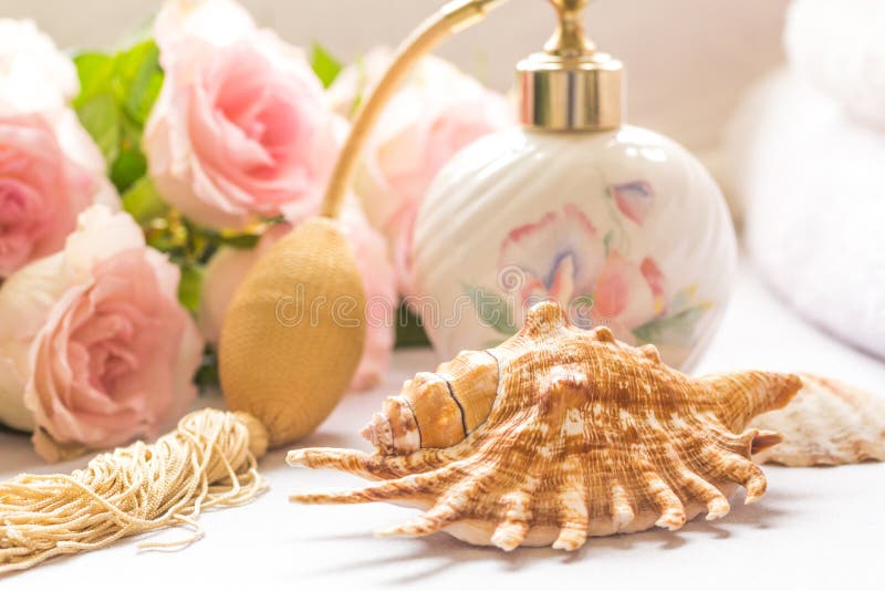Bath Arrangement with Parfume Bottle and Pretty Flowers Stock Photo ...