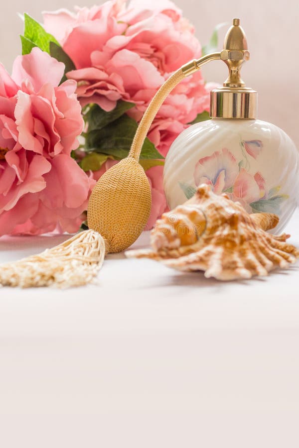 Bath Arrangement with Parfume Bottle and Pretty Flowers Stock Photo ...