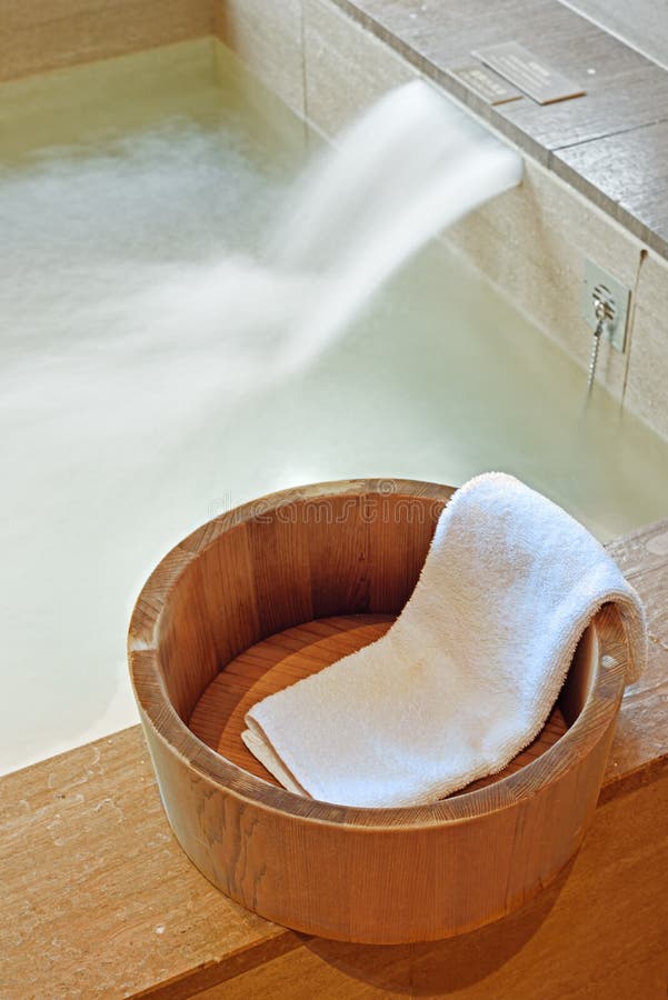 Bath bucket with a towel stock image. Image of blanket - 136837717