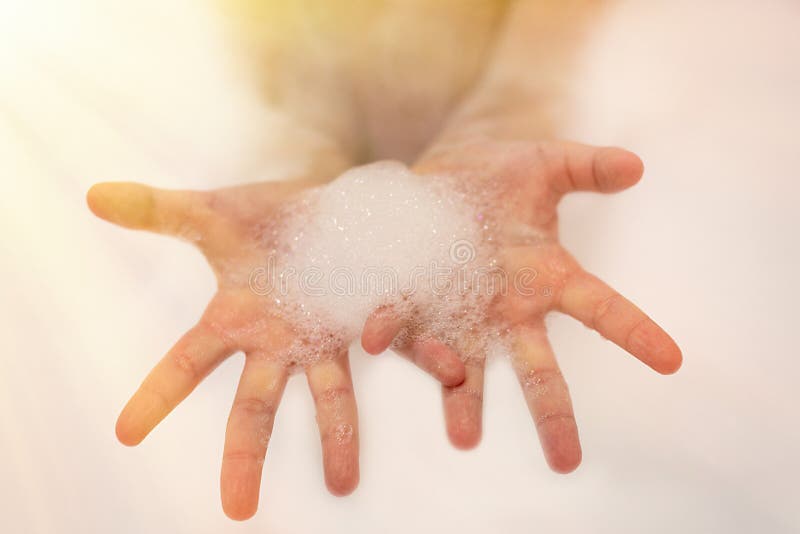 Bath Foam. Baby Hands in Bubble Bath, Baby Washing in Bubble Bath Stock ...