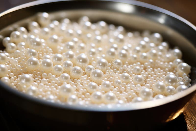 Bath Pearls Spread Elegantly Around an Empty Tub Stock Photo - Image of ...