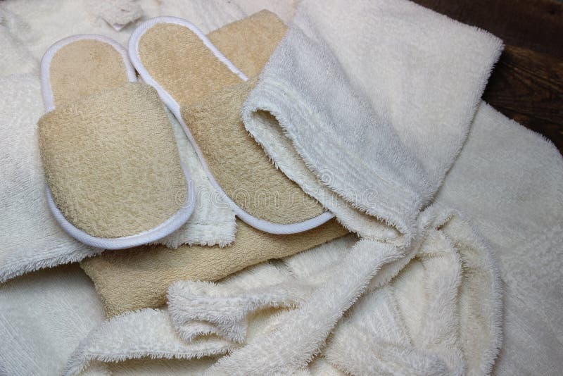 Bath slippers and bathrobe stock photo. Image of bath - 132134072