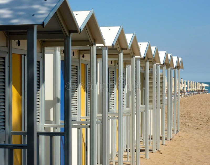 Bathing boxes on a beach stock image. Image of repetition - 32016819