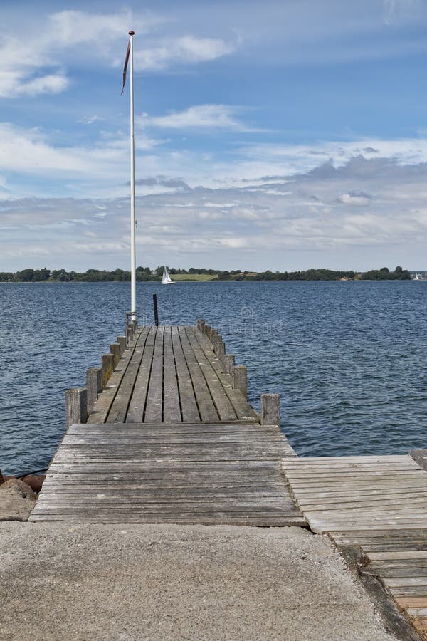 Bathing Jetty and Landing Stage for Boats with Blue Water Stock Photo ...