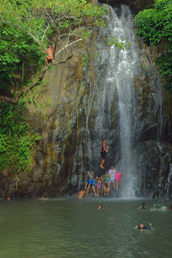 Bathing at the waterfall editorial stock photo. Image of nature - 104279883