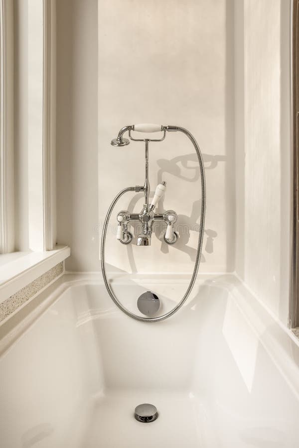 Bathroom with Bathtub and Shower System Stock Image - Image of clean ...