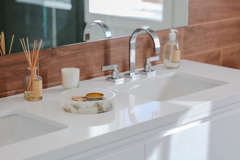 Bathroom Counter with Two White Sinks and a Large Mirror Stock Photo ...