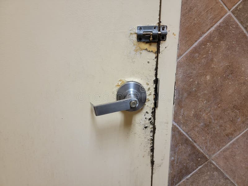 Bathroom Door with Corrosion or Damage on Door and Lock Stock Image ...
