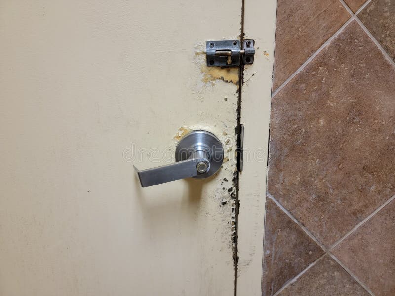 Bathroom Door with Corrosion or Damage on Door and Lock Stock Photo ...