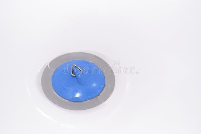 Bathroom Drain is Closed with Blue Plug. Stock Photo - Image of hole ...