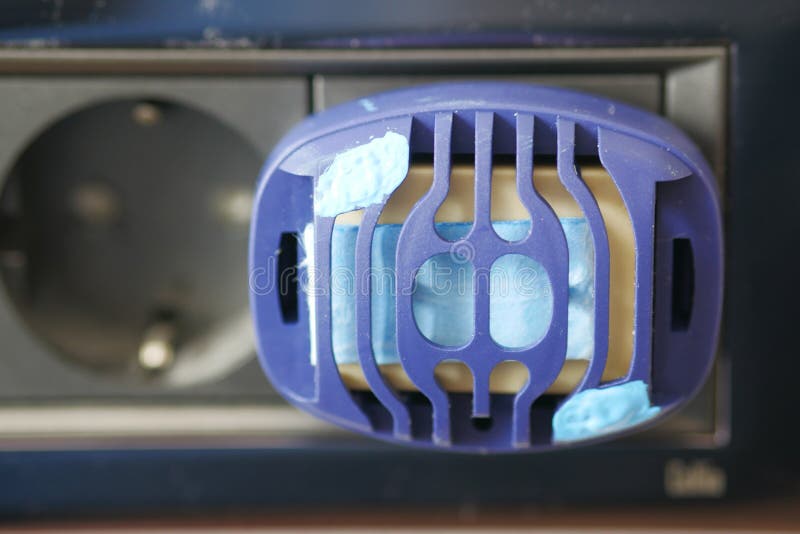 Bathroom Freshener Plug-in with Blue Fragrance Insert Stock Image ...