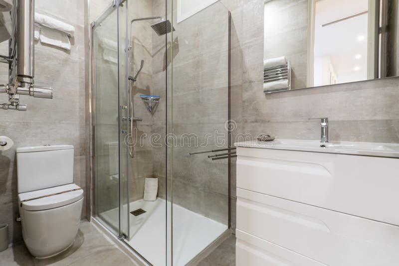 Bathroom with Marble Walls, Square Frameless Mirror, White Vanity Stock ... Bathroom with Marble Walls, Square Frameless Mirror, White Vanity Stock ...