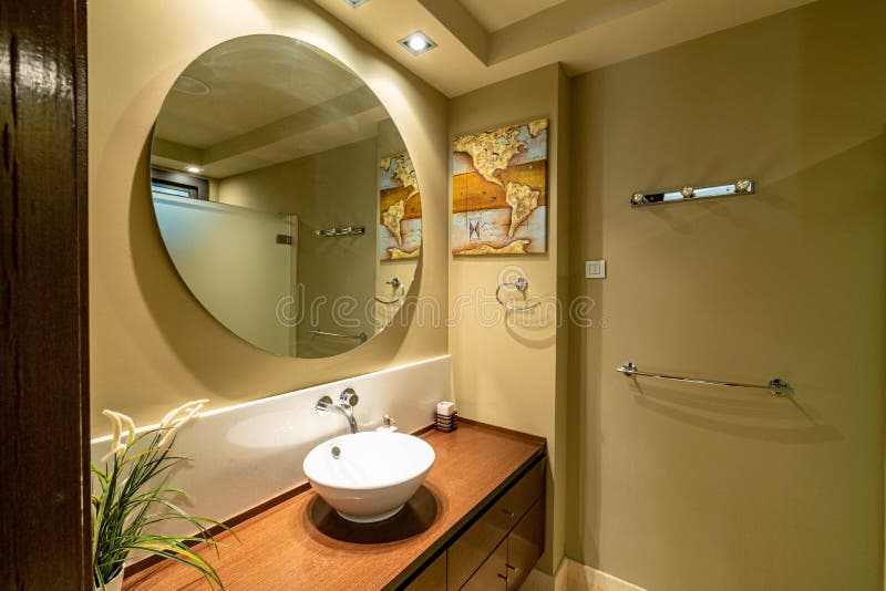 Bathroom Sink and Circular Mirror Inside Bathroom Stock Photo - Image ...
