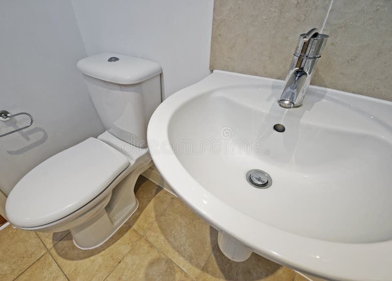 Bathroom sink and toilet stock image. Image of clean - 11922253