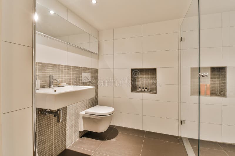 A Bathroom with a Sink and a Toilet Stock Image - Image of indoors ...