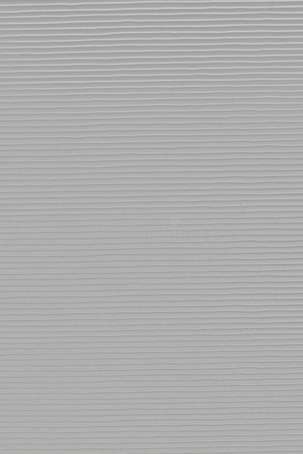 A Bathroom Wall with Cream-colored Grated Modern Style Tiles Stock ...