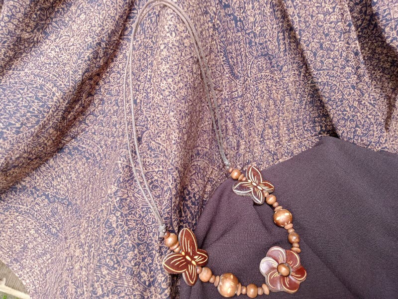 Batik Fabric and Coconut Shell Necklace in Brown Shades Stock Photo ...