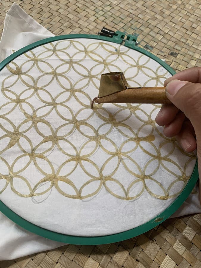 Batik Making Process with Canting on Fabric in Embroidery Hoop Stock ...