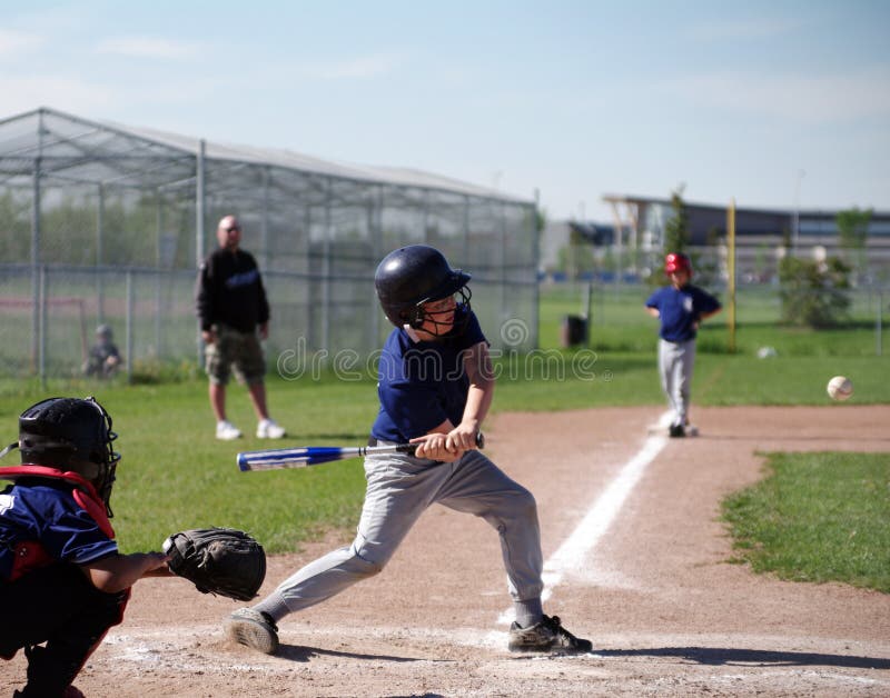 Boy Batter Batting Baseball Stock Photo - Image of sports, field: 2349110
