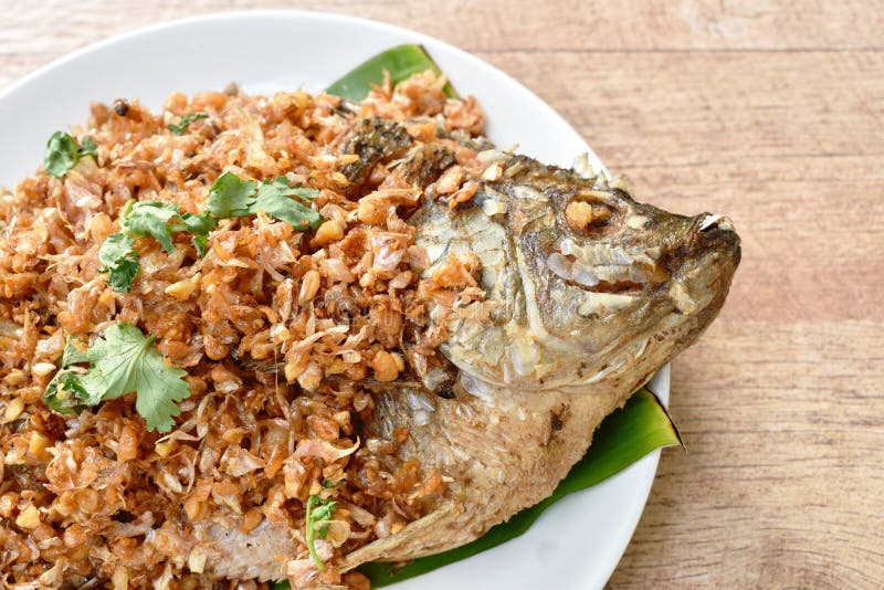 Batter Fried Mango Fish Topping Chop Garlic on Banana Leaf Stock Image ...