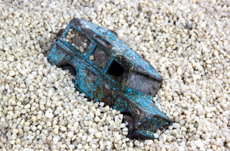 Battered Blue Toy Car in Sand Pit Against Blue Sky Stock Image - Image ...