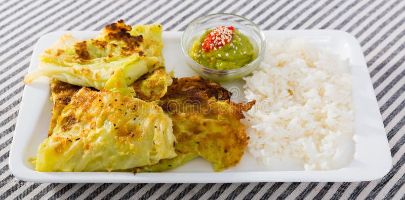 Battered cabbage with rice stock image. Image of avocado - 194346059