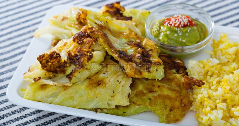 Battered cabbage with rice stock photo. Image of dish - 295518888