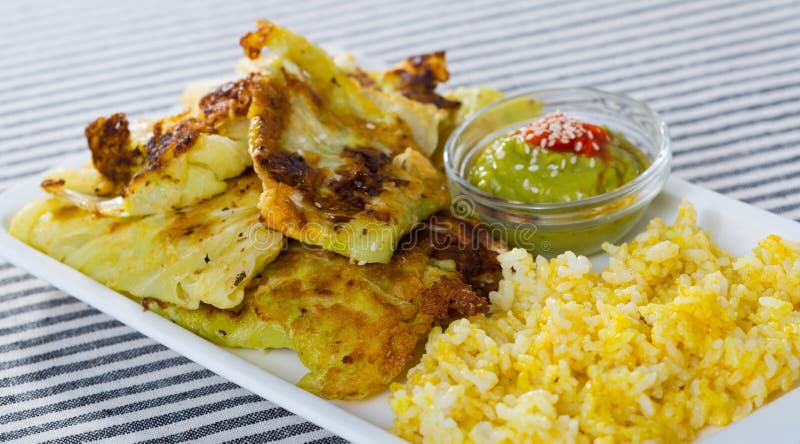 Battered cabbage with rice stock image. Image of served - 244784899