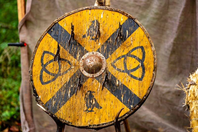 A Battered and Dirty Shield with a Celtic Cross on it Stock Photo ...