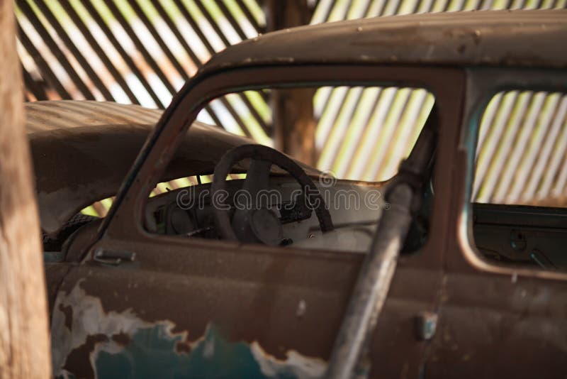 A Battered Old Abandoned Car Completely Rusted Stock Image - Image of ...