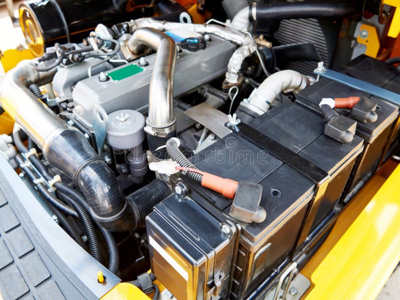 Batteries and car engine stock photo. Image of battery - 254796742