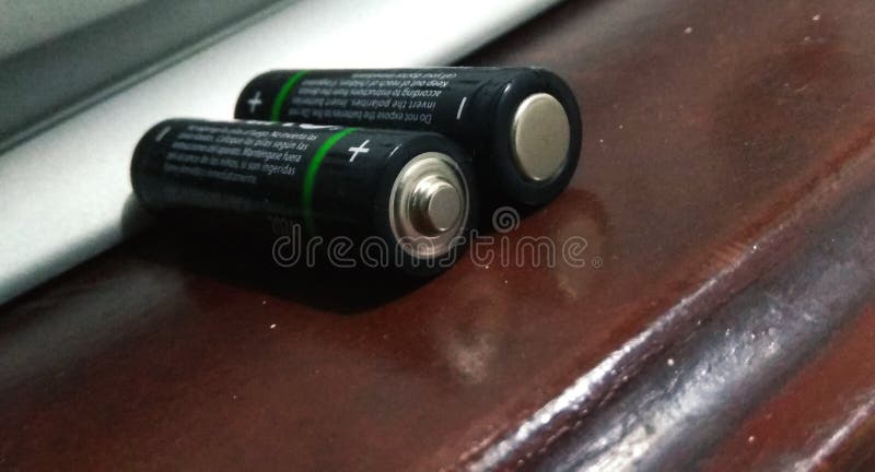 Battery AA plus and minus stock photo. Image of battery - 128354546