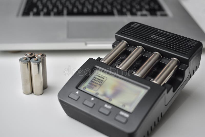 Battery Charger with Rechargeable Batteries Stock Photo - Image of ...