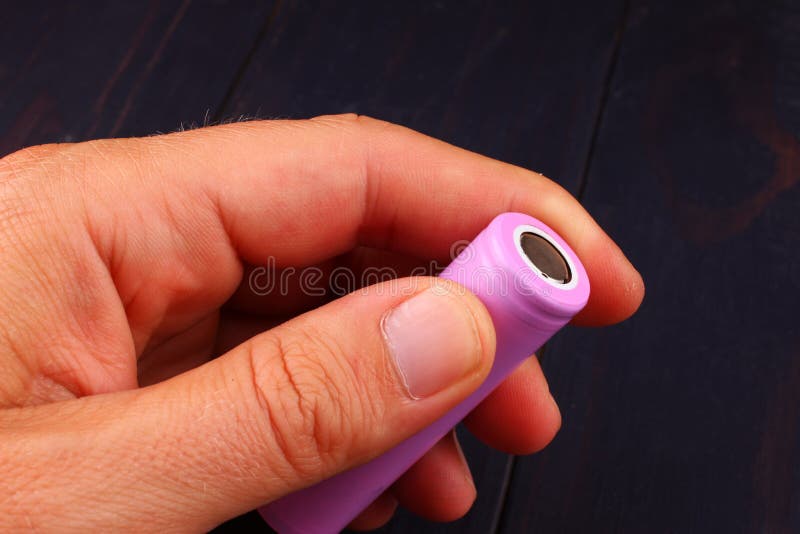 The 18650 Battery in the Hand is a Popular Battery Stock Image - Image ...