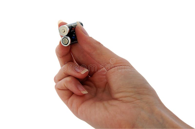 Battery - Small AAA Battery, Held between Fingers Stock Photo - Image ...