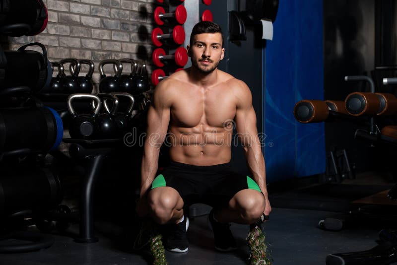 Young Man Battling Ropes at Gym Workout Exercise Stock Photo - Image of ...