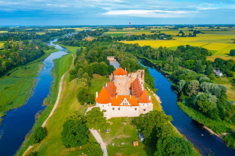 Bauska Castle Museum in Latvia Stock Photo - Image of forest, ruin ...