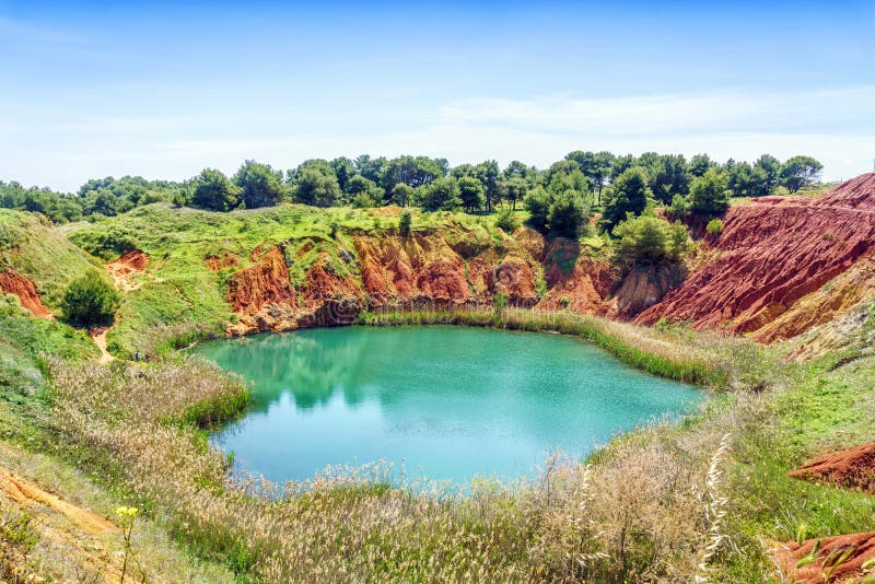 Bauxite Quarry Lake in Otranto, Italy Stock Photo - Image of chemical ...