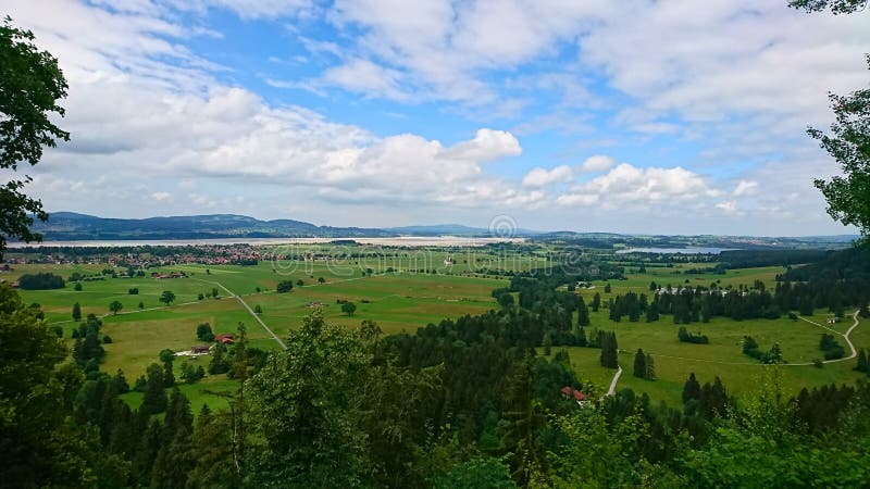 Panoramic View of the Lush Green Fields and Distant Mountains Under a ...