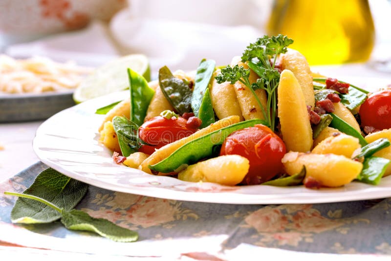 Bavarian Fried Finger-shaped Potato Dumplings with Vegetable. Stock ...