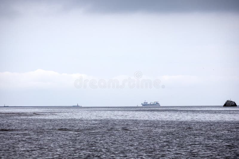 .a Bay with Calm Water and a Ship Visible in the Distance Stock Image ...
