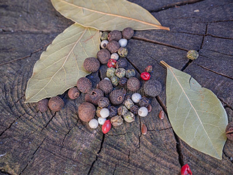 Bay Leaves with the Background of a Walnut Trunk Along with Pepper and ...