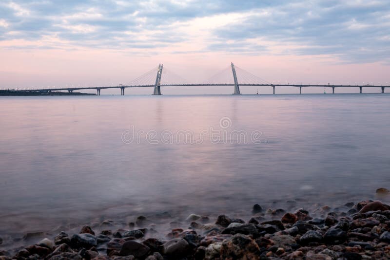 Bay in the Rays of the Rising Sun. Bridge and Cityscape Stock Photo ...
